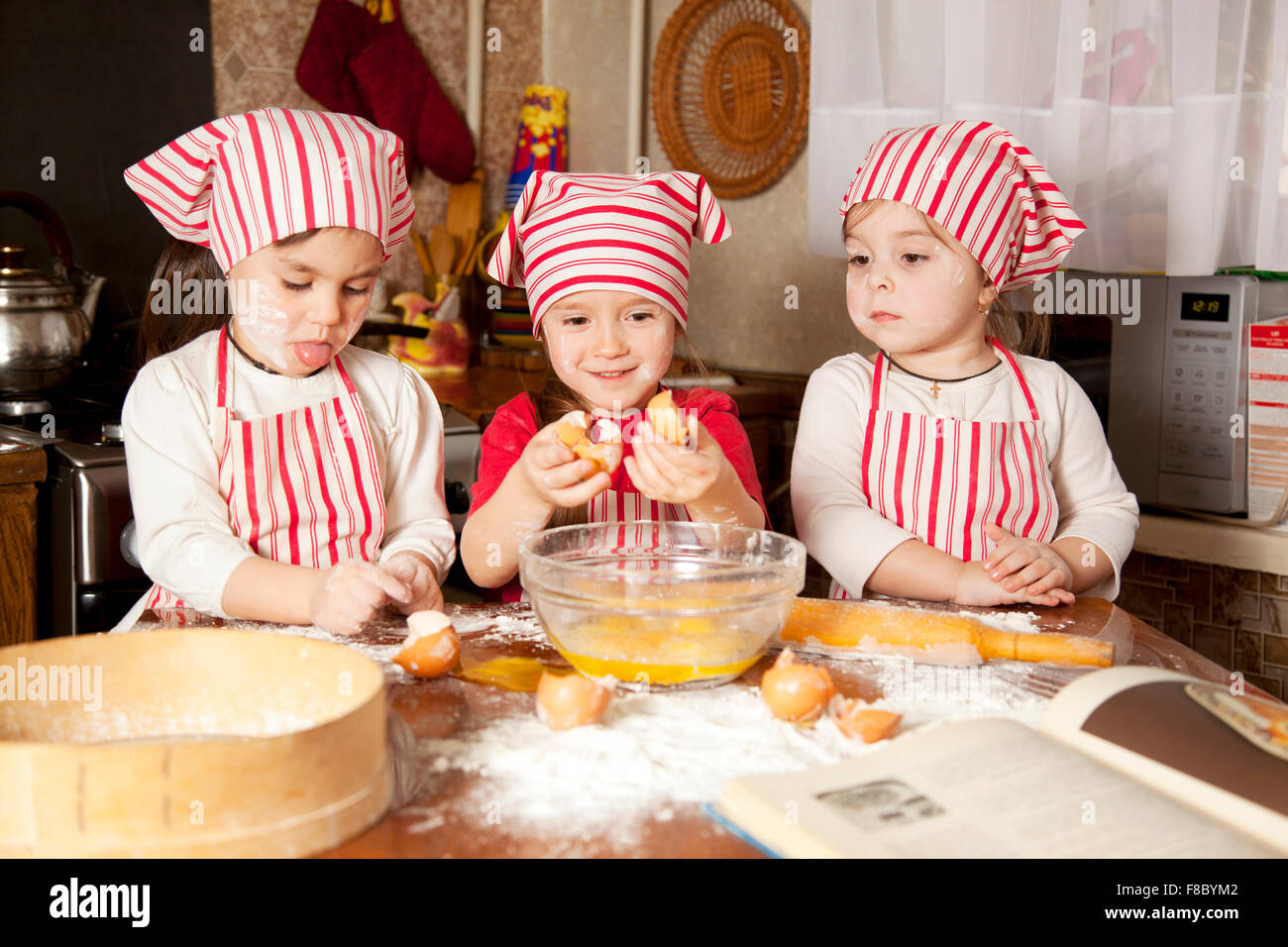 Kids making mess in kitchen hi-res stock photography and images - Alamy