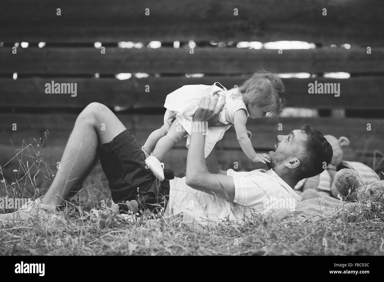 Caucasian family smiling happy father Black and White Stock Photos ...