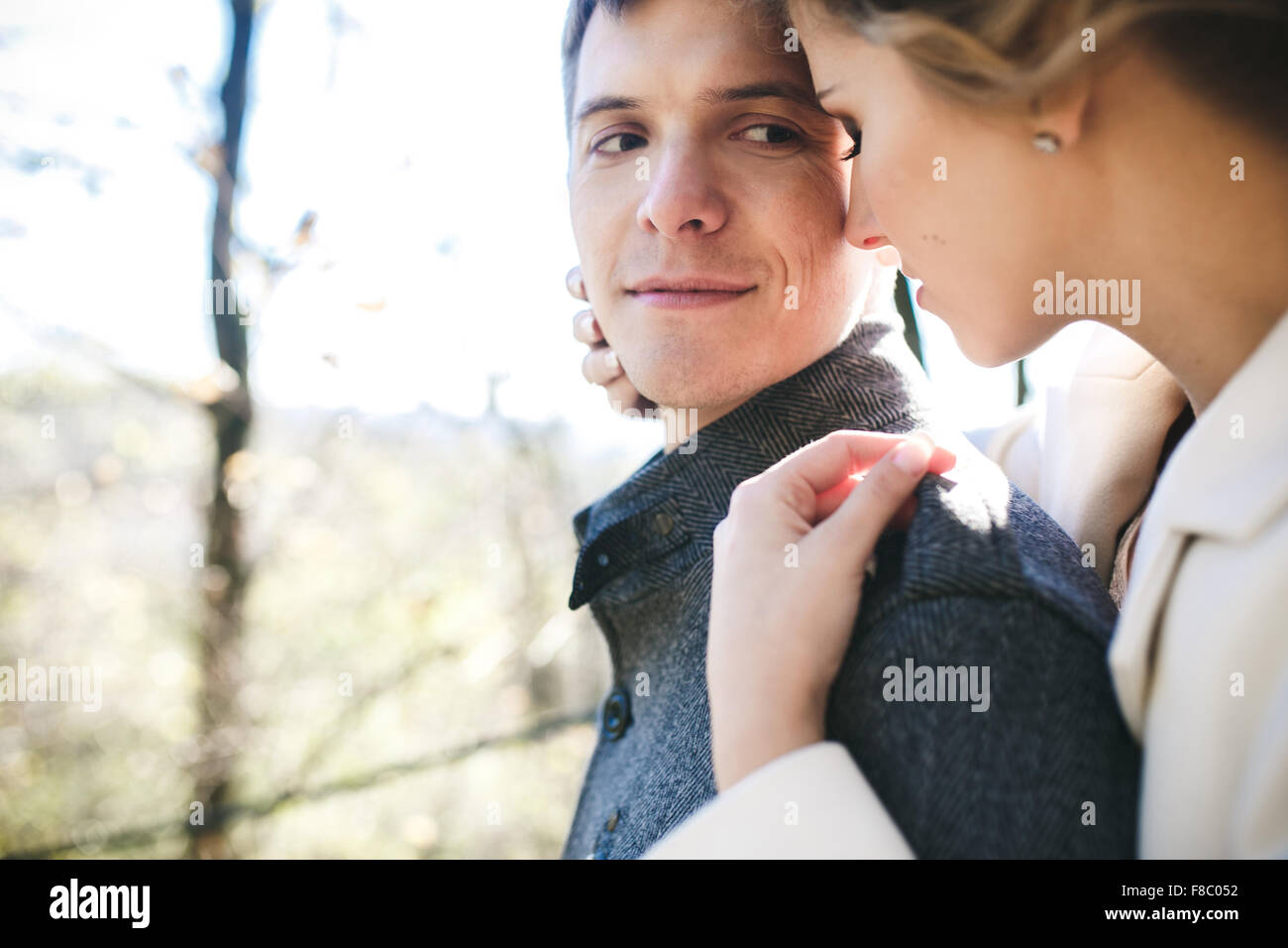 Bride hugs groom Stock Photo - Alamy