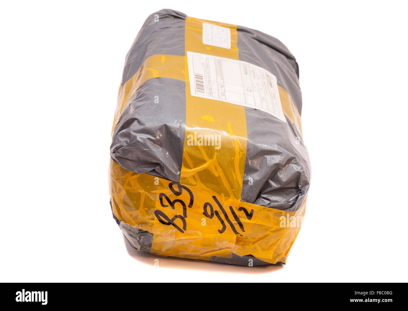 Postal package isolated on white background Stock Photo - Alamy