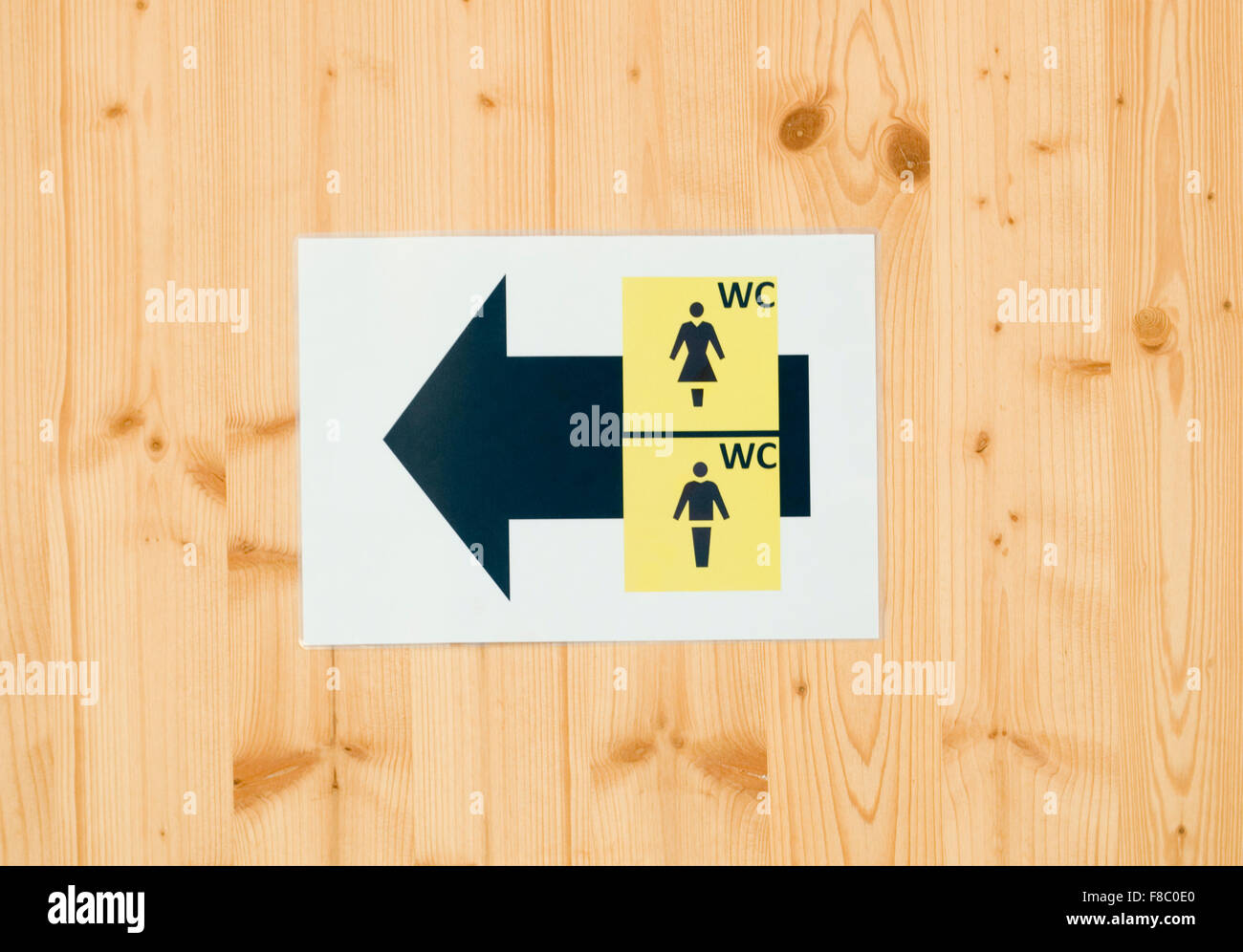 Toilet sign arrow Stock Photo - Alamy