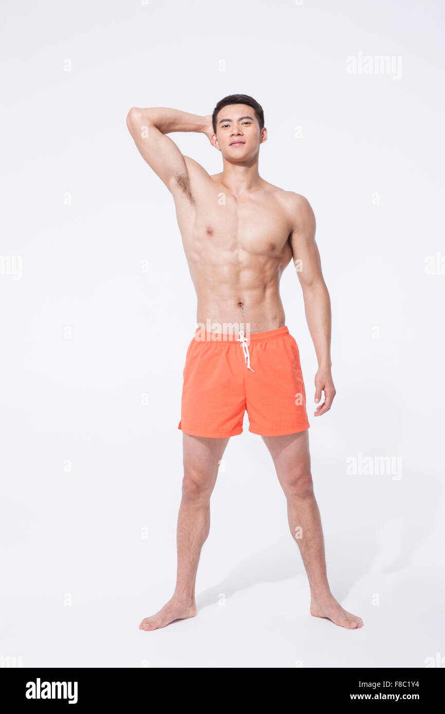 Male Putting On Pants