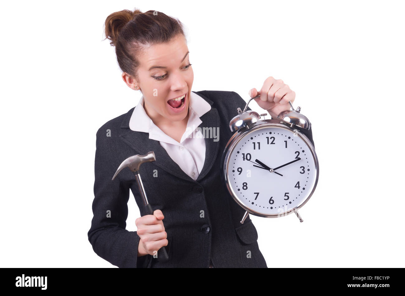 Woman trying to break the clock Stock Photo - Alamy