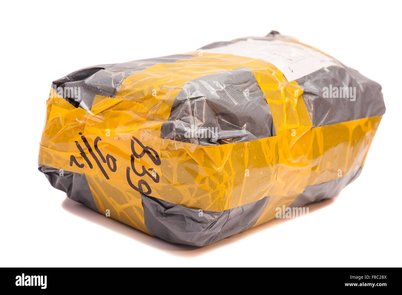 Postal package isolated on white background Stock Photo - Alamy