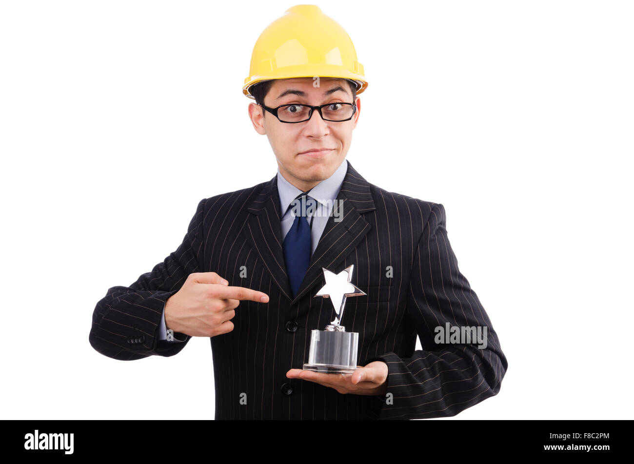Funny guy with prize and hardhat Stock Photo - Alamy
