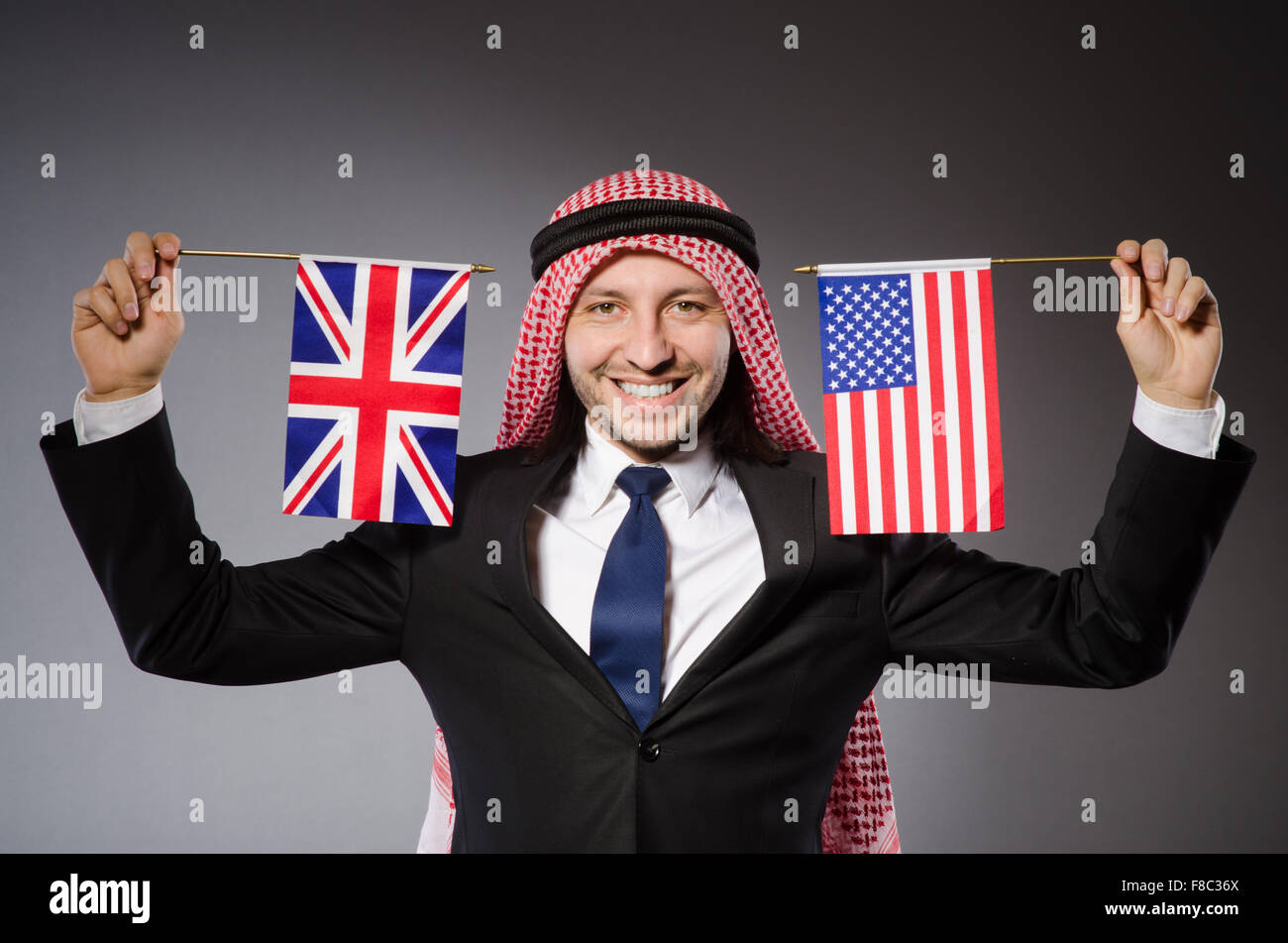 Arab man with united kingdom flag Stock Photo - Alamy