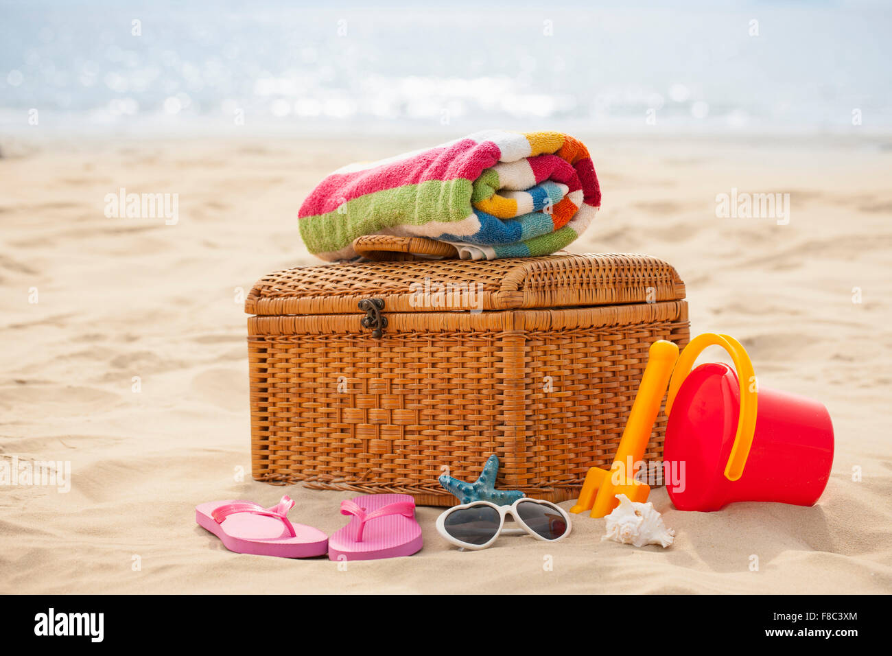 Beach related materials on sand in out-focused effect with the ...