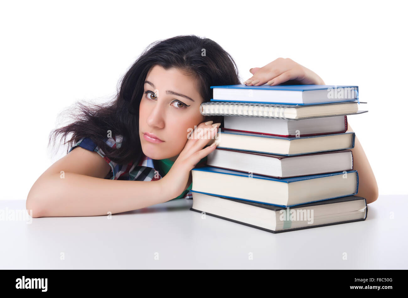 Tired student with textbooks on white Stock Photo - Alamy