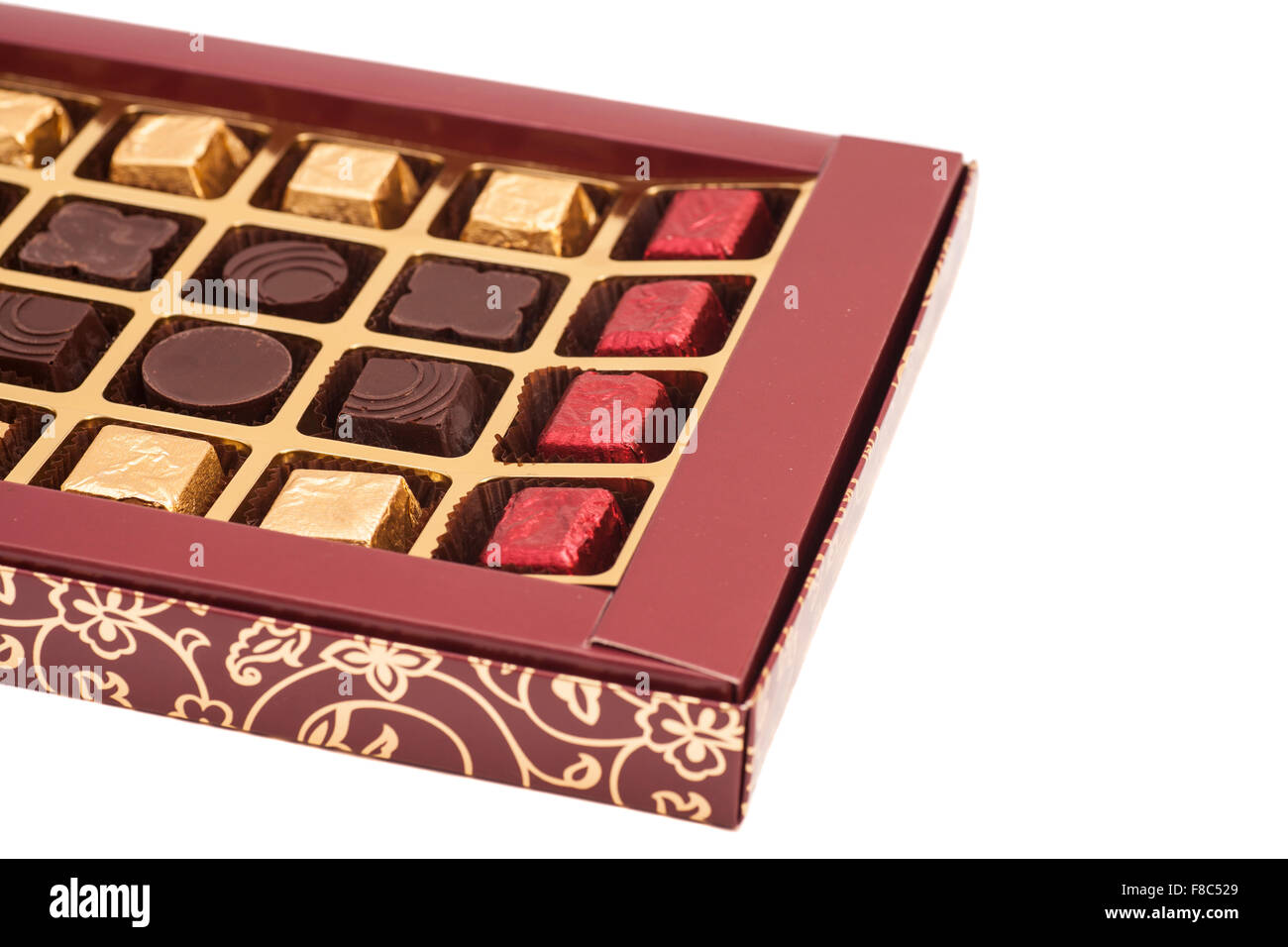 Box of chocolate candies isolated on white Stock Photo - Alamy