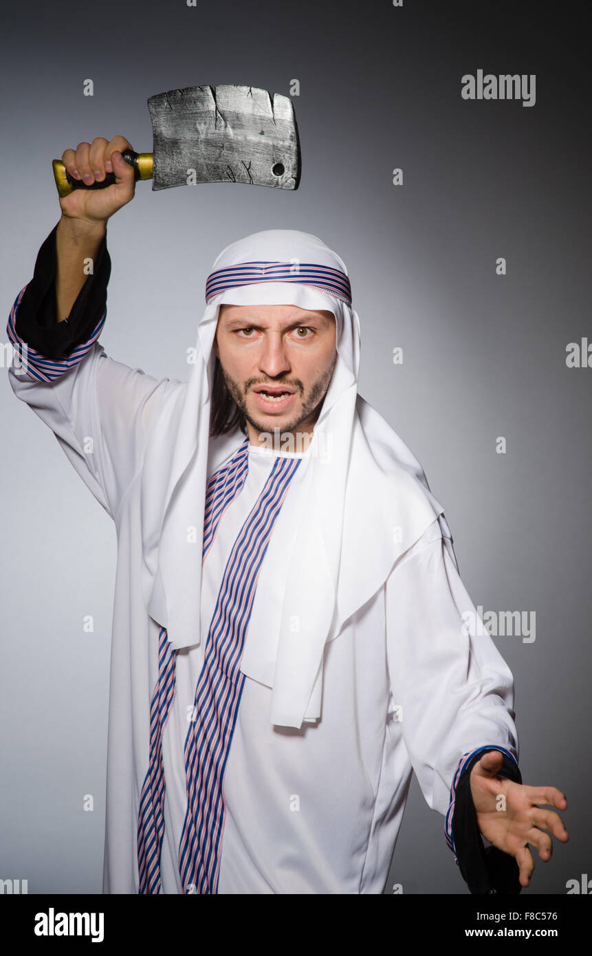 Arab man with sharp axe Stock Photo - Alamy