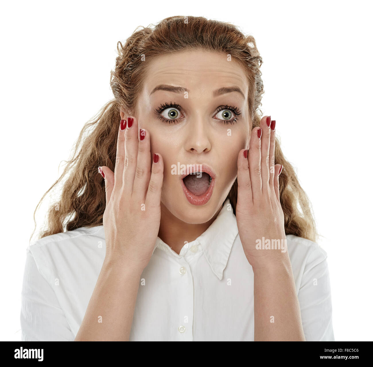 Businesswoman with a shock expression on her face isolated on white ...