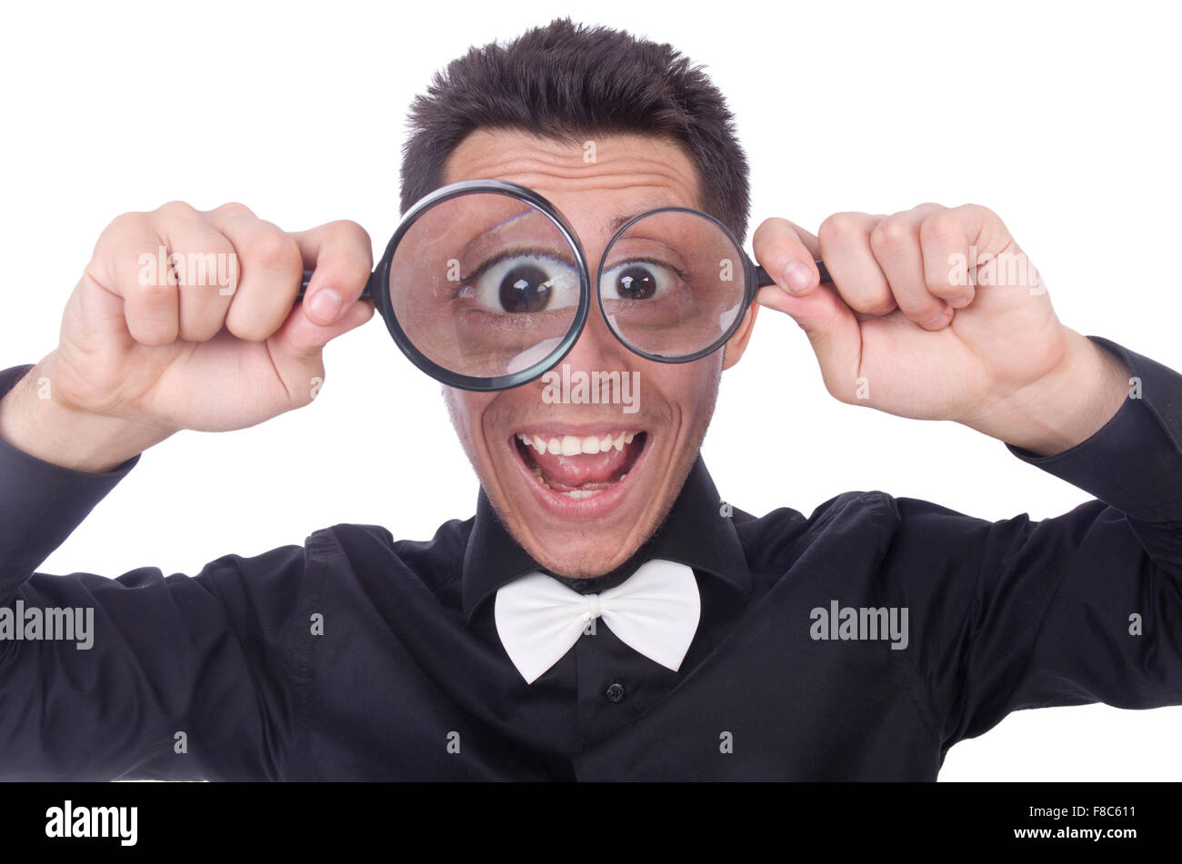 Funny man with magnifying glass Stock Photo - Alamy
