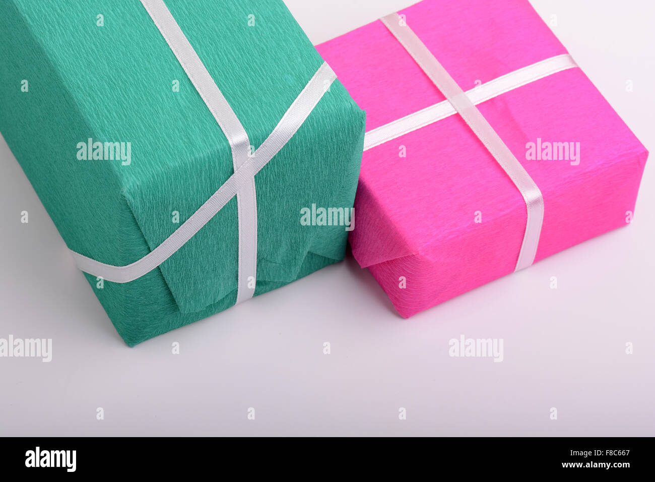 gift box set with white ribbon on white background Stock Photo - Alamy