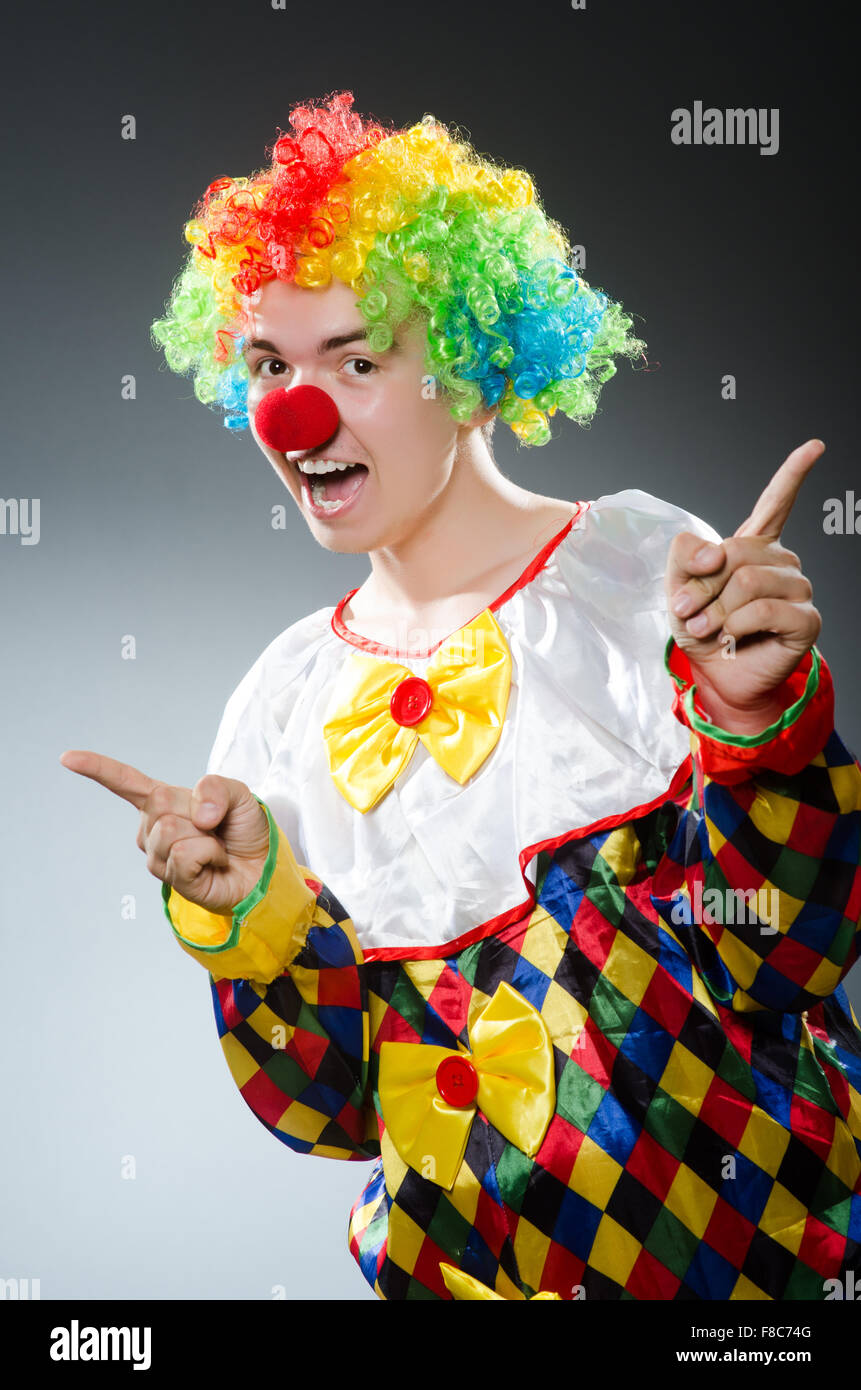 Funny clown in the studio Stock Photo - Alamy