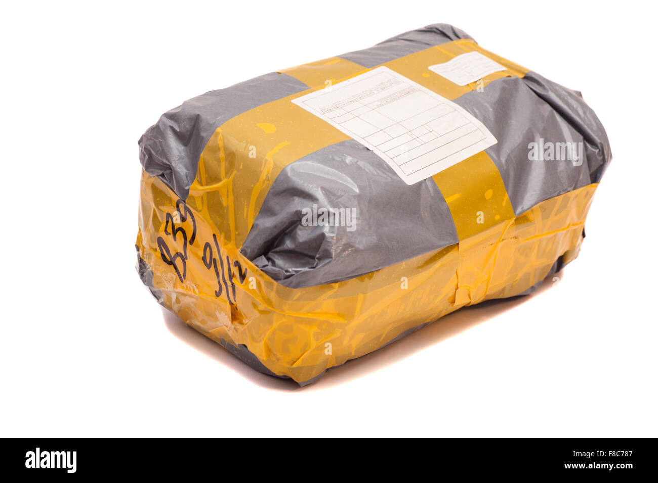 Postal package isolated on white background Stock Photo - Alamy