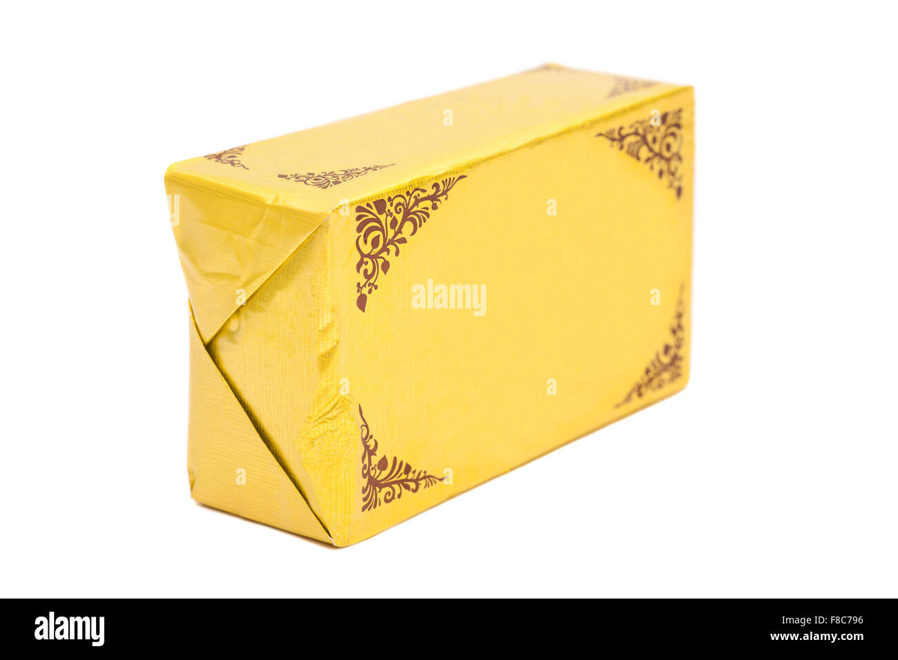 Stick of wrapped butter on white background Stock Photo - Alamy