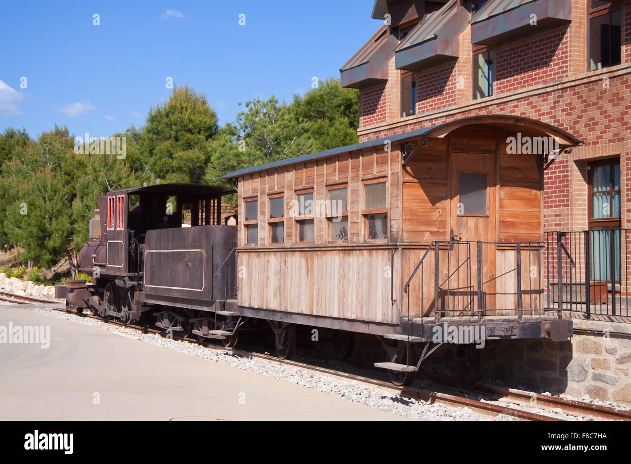 Old steam locomotive with wooden wagon Stock Photo - Alamy