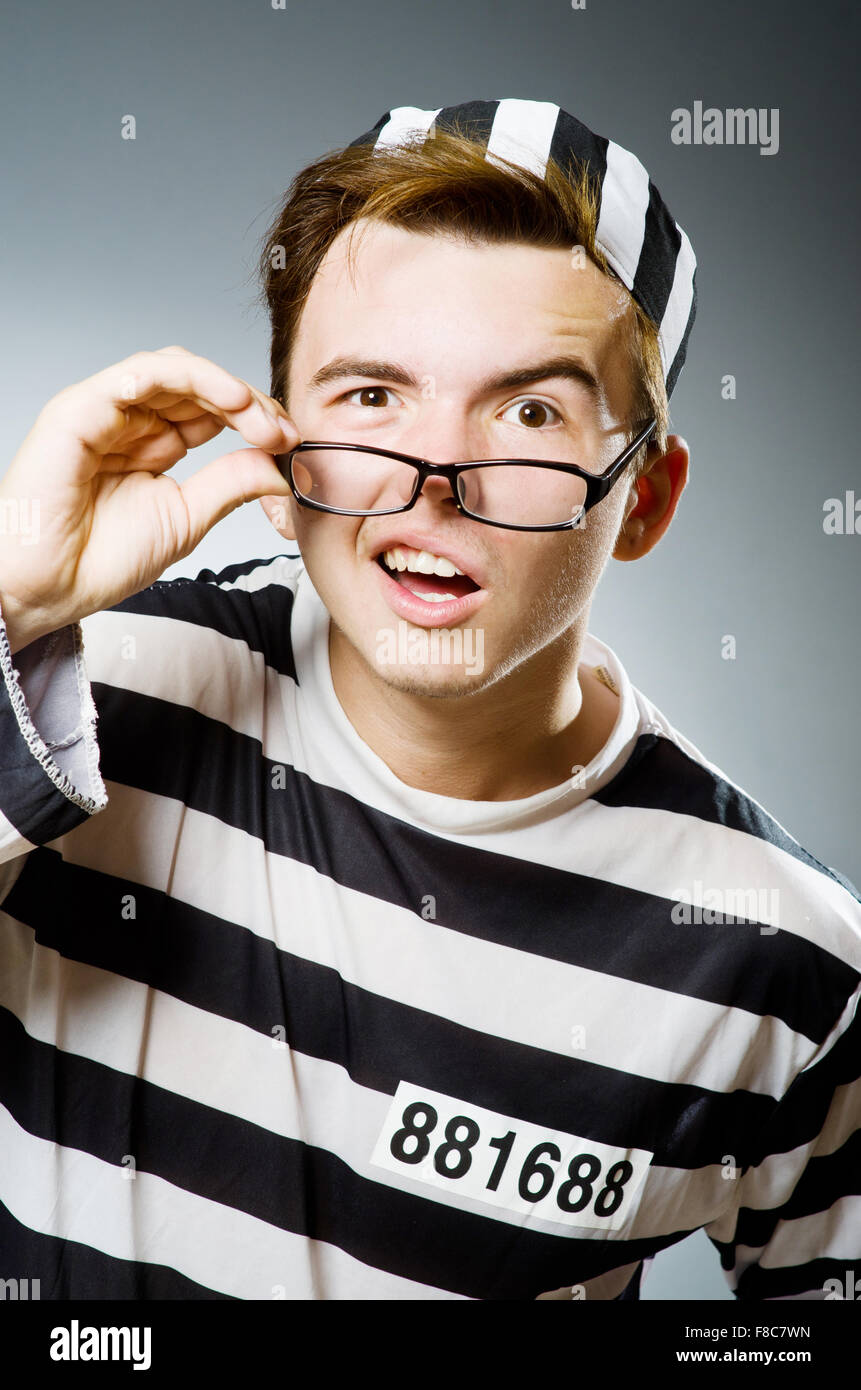 Funny prison inmate in concept Stock Photo - Alamy