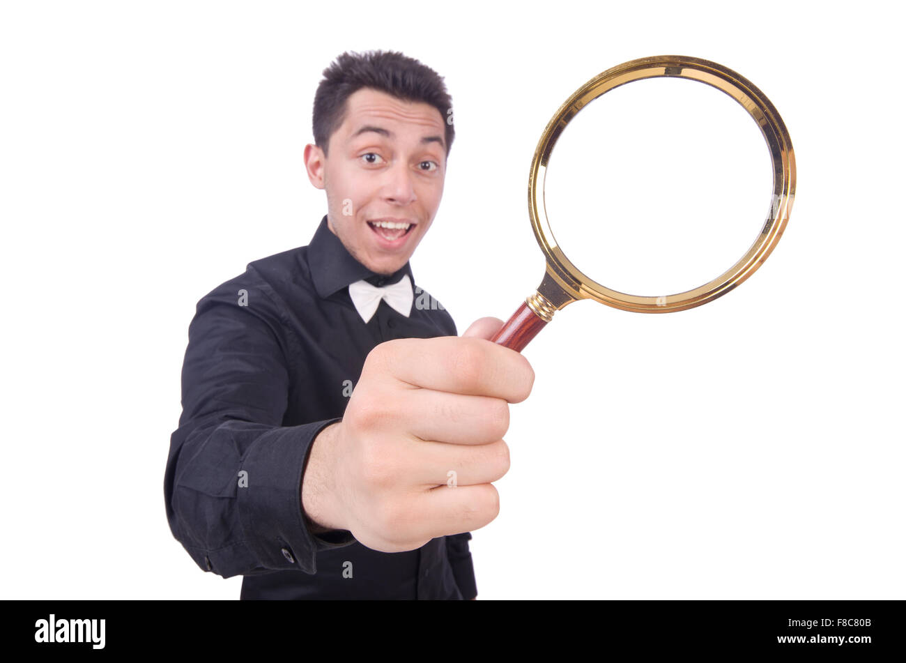 Funny man with magnifying glass Stock Photo - Alamy