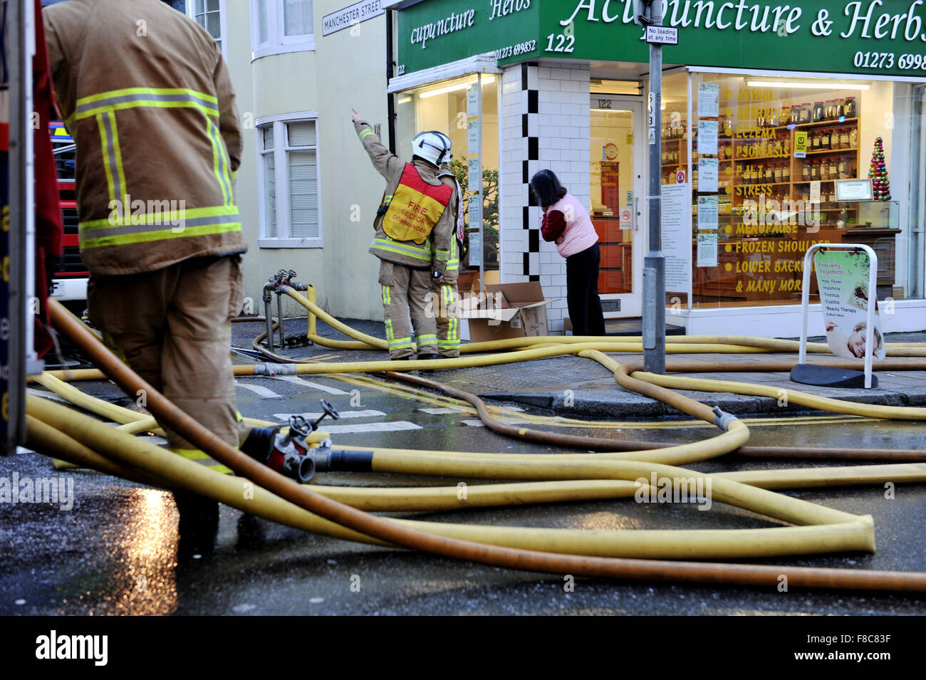 Brighton UK 8th December 2015 - Fire crews form four stations including ...