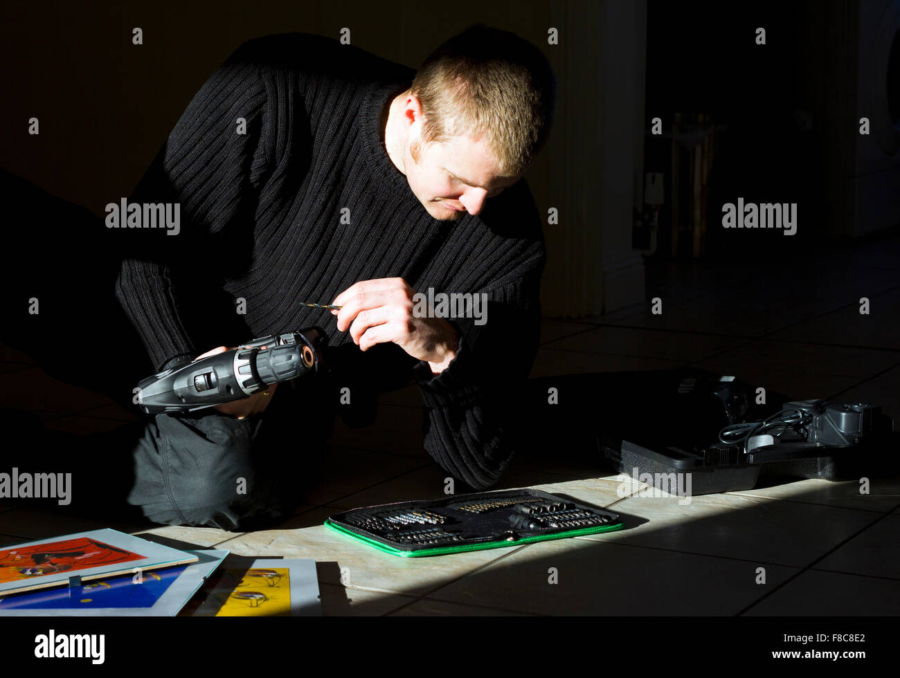 Man doing DIY Stock Photo - Alamy
