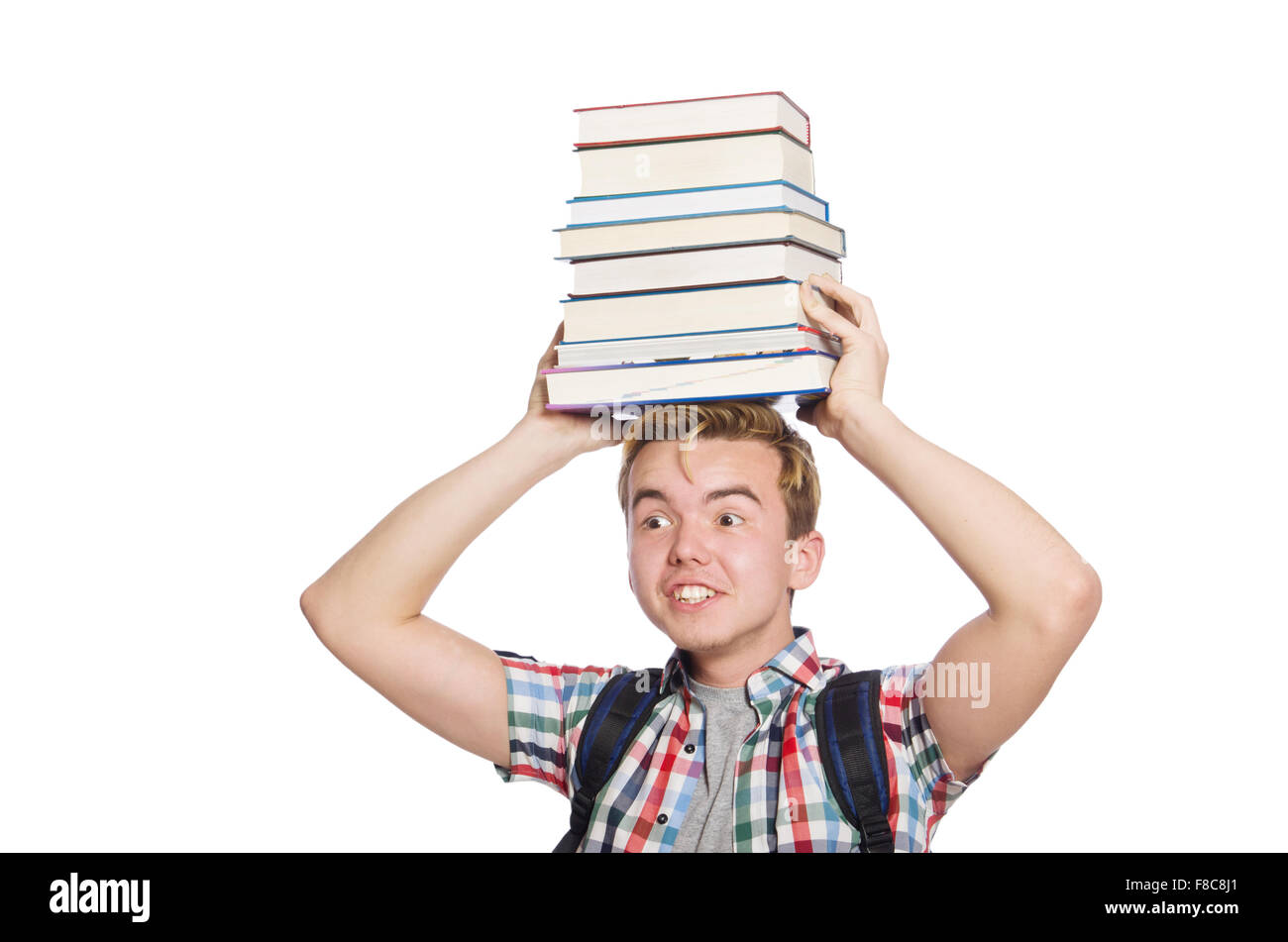 Funny student with stack of books Stock Photo - Alamy