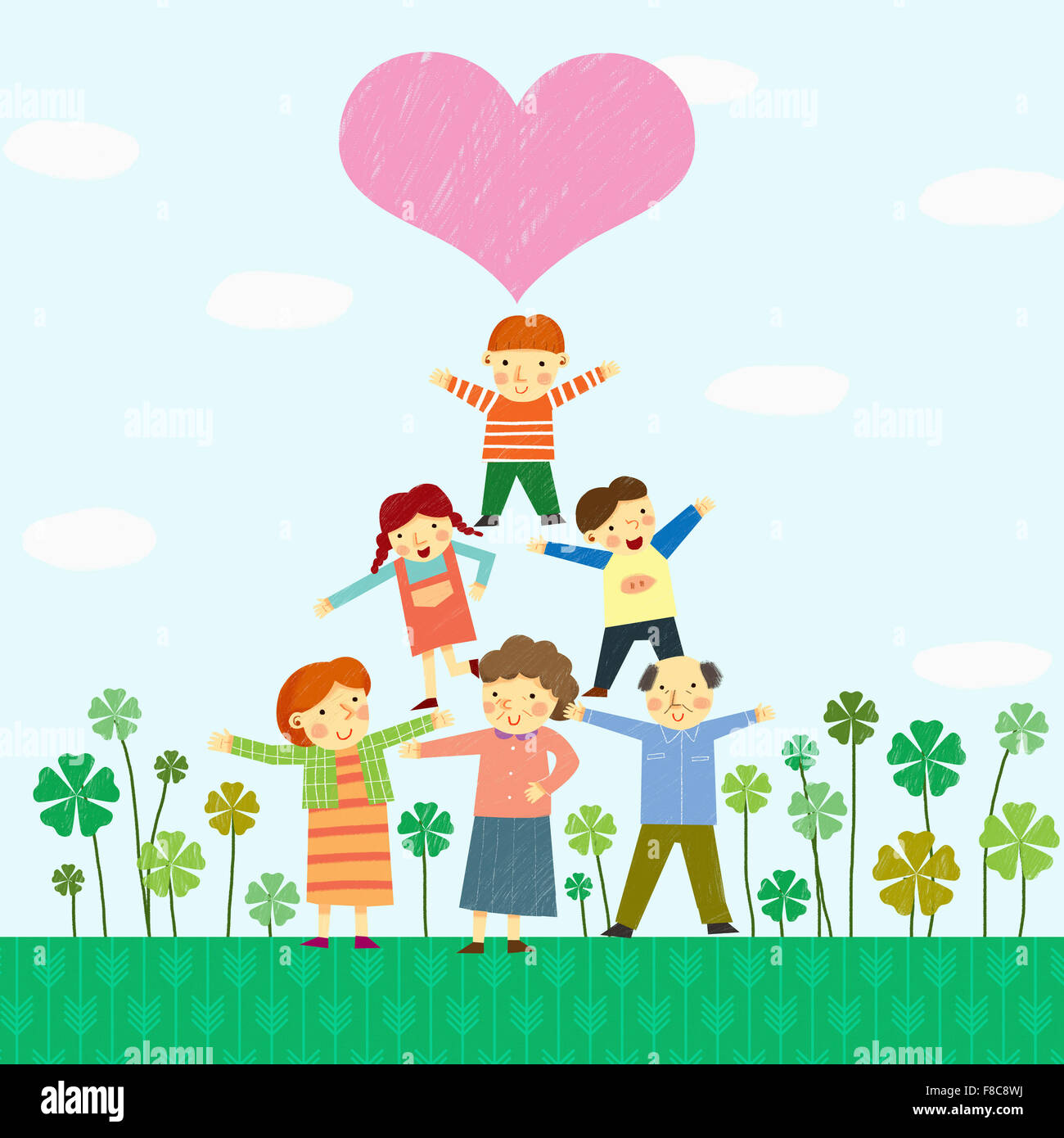 Harmonious family standing in a pyramid formation with heart and four ...