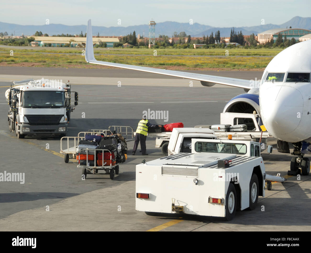 Airport cargo loading car hi-res stock photography and images - Alamy