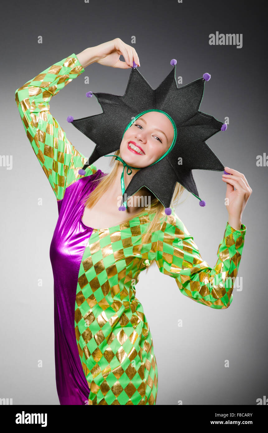 Funny clown in colourful costume Stock Photo - Alamy