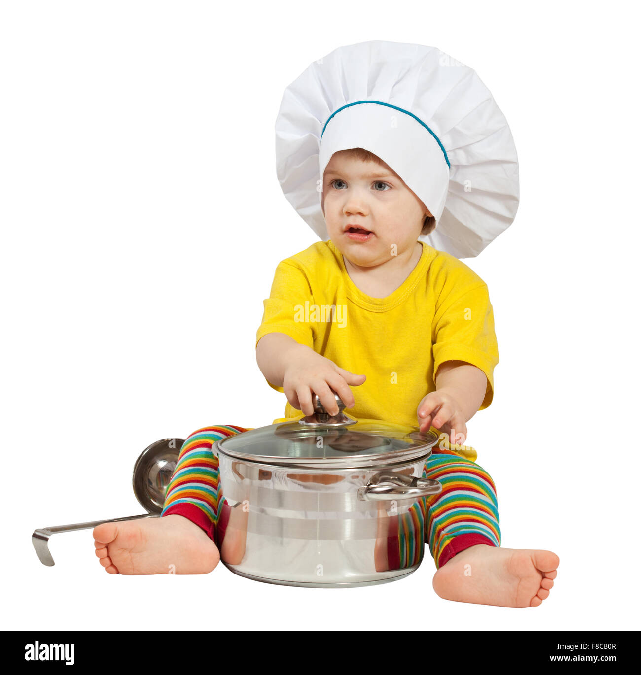 Baby cook in toque with pan. Isolated over white background Stock Photo ...