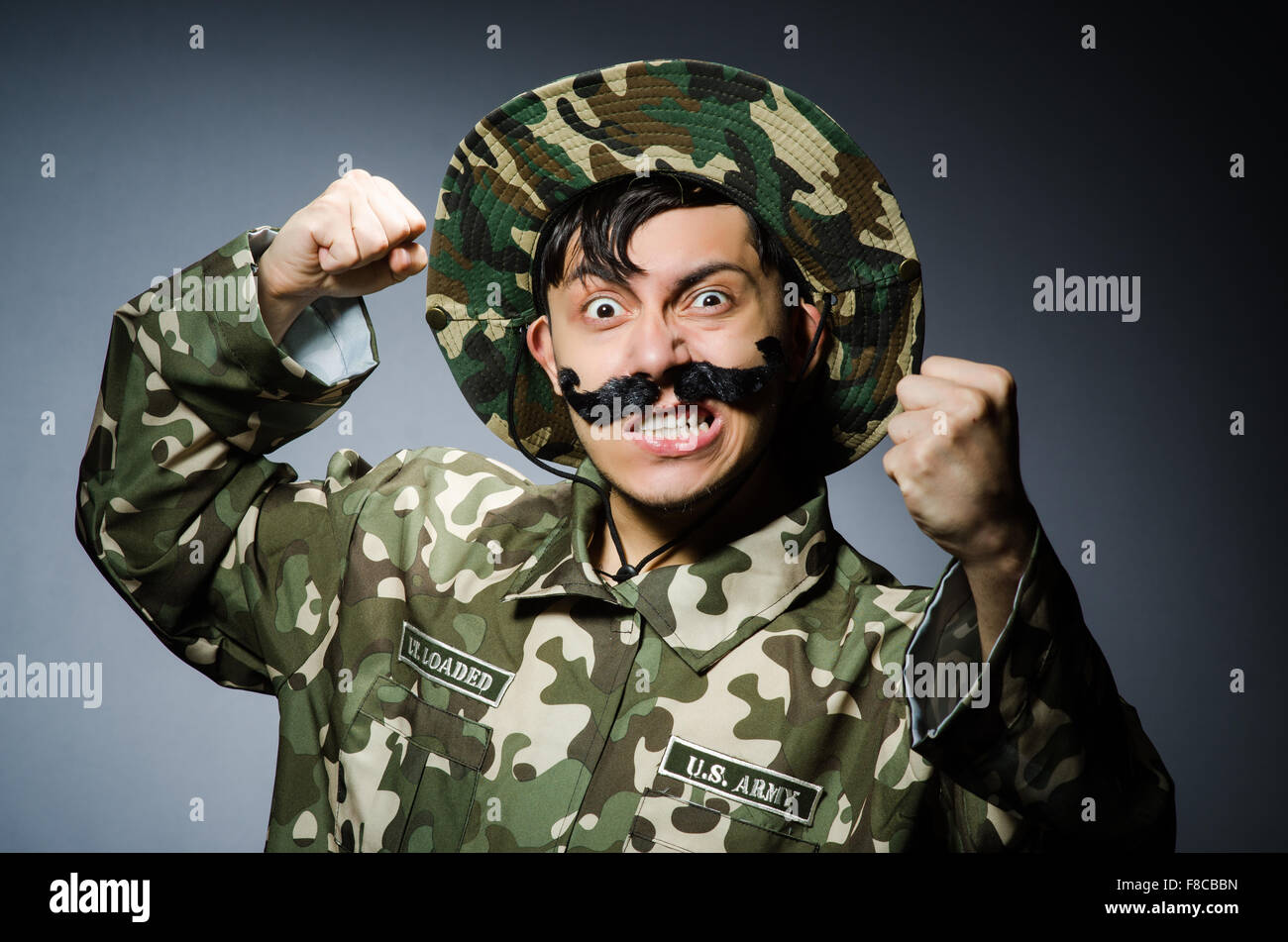 Funny soldier in military concept Stock Photo - Alamy