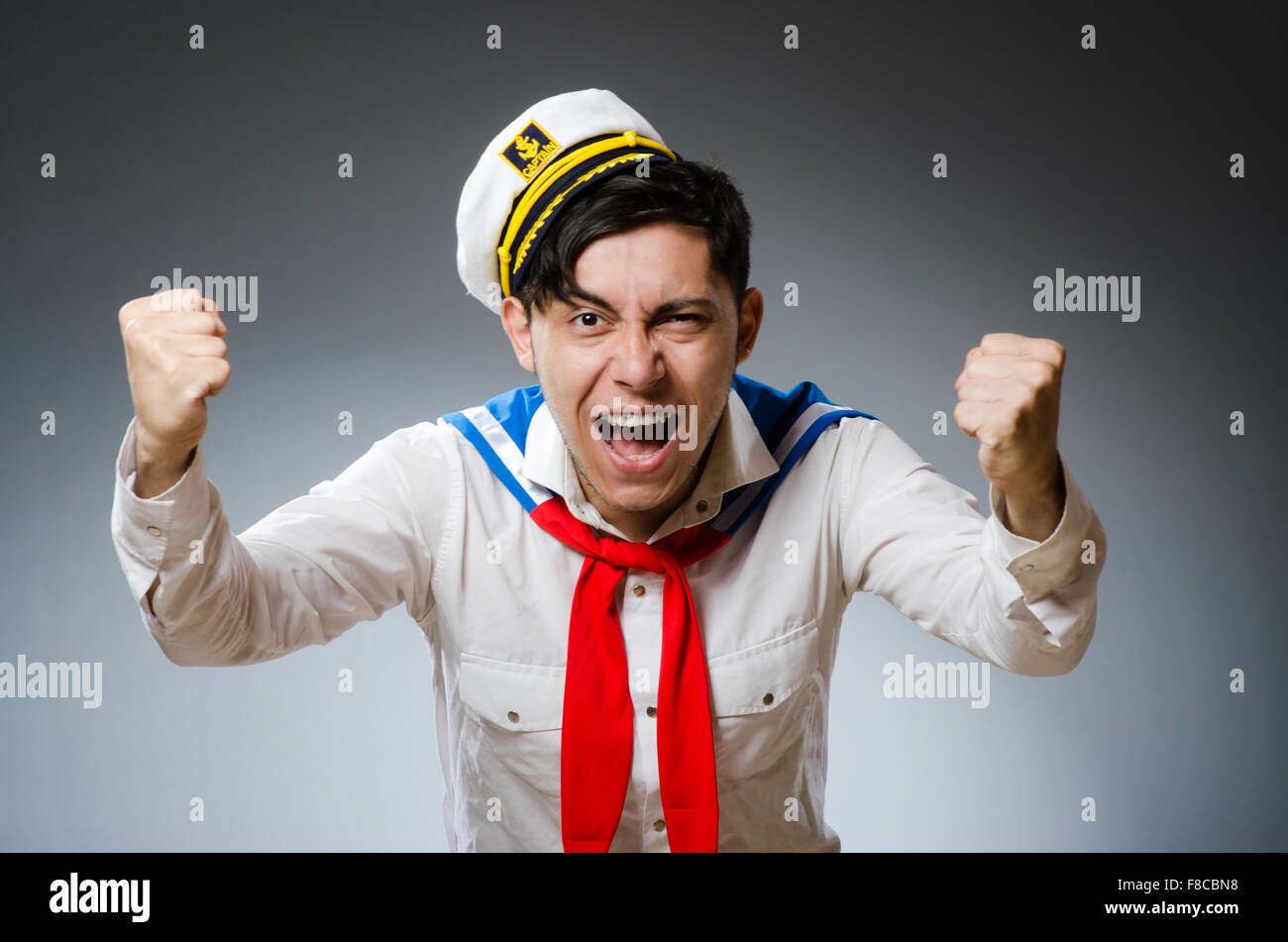 Funny captain sailor wearing hat Stock Photo - Alamy