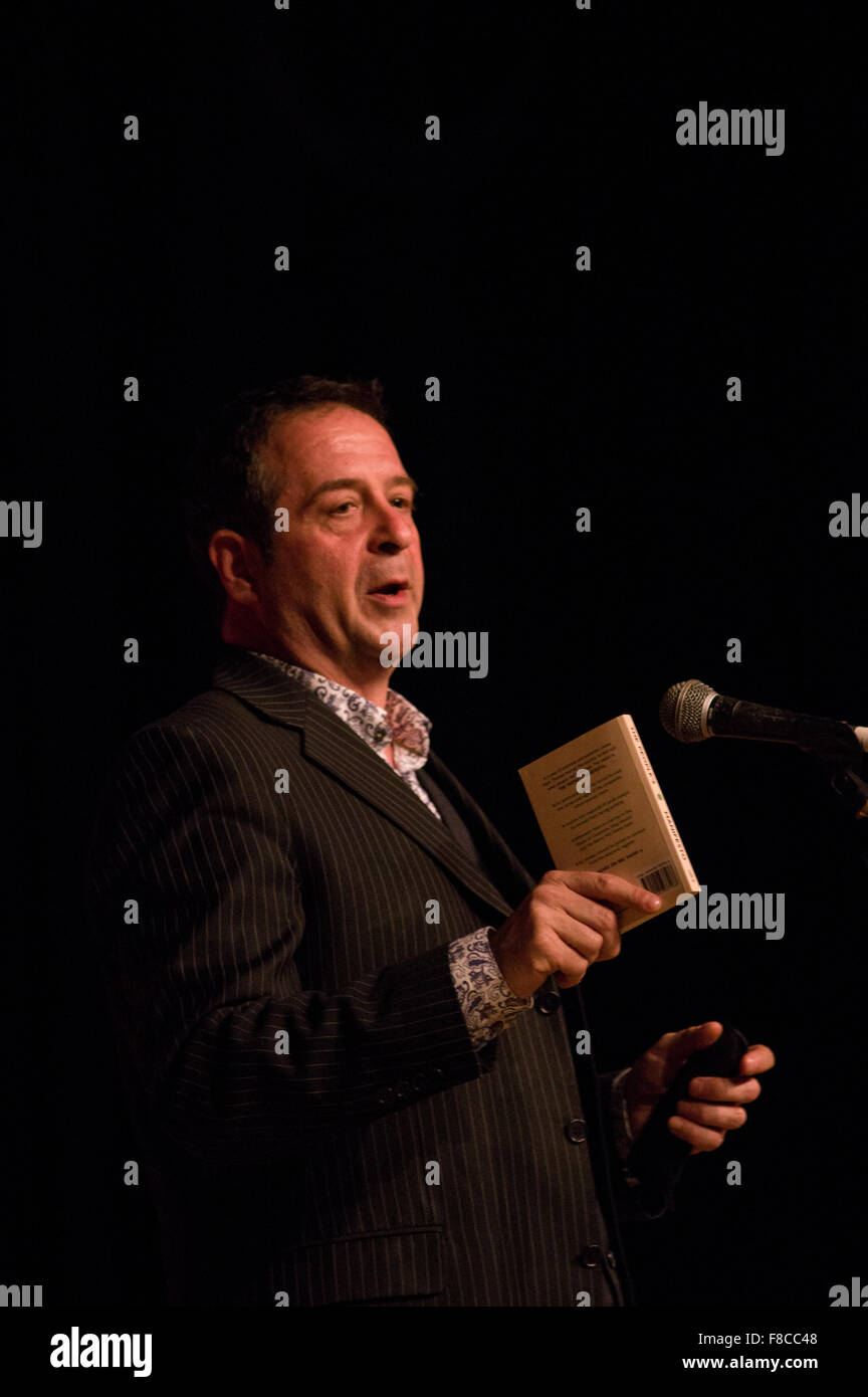 Comedian Mark Thomas reading from his book The People's Manifesto in ...