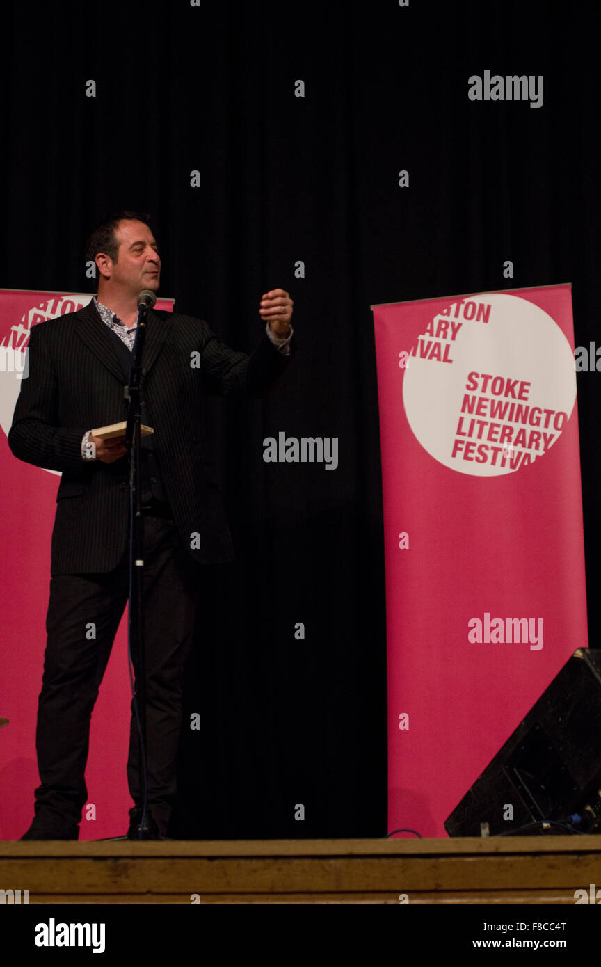 Comedian Mark Thomas reading from his book The People's Manifesto in ...