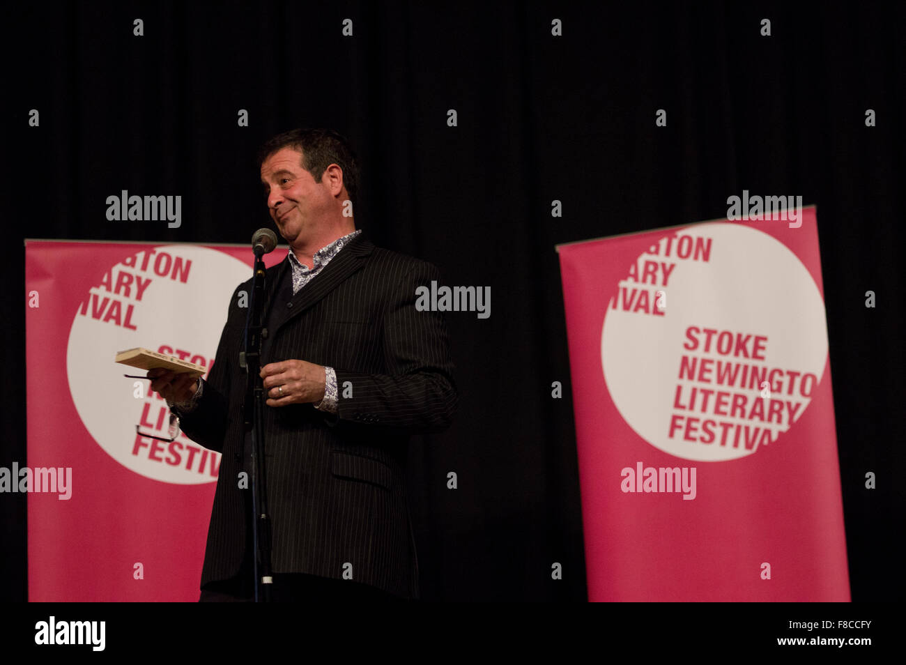 Comedian Mark Thomas reading from his book The People's Manifesto in ...