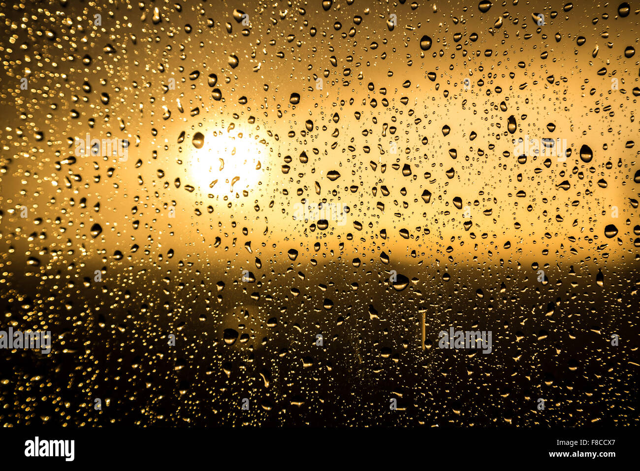 London, UK. 8th December, 2015. UK Weather: Rainstorm during sunset ...