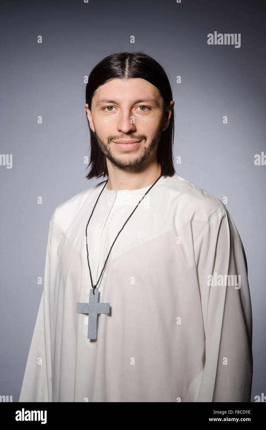 Priest man in religious concept Stock Photo - Alamy