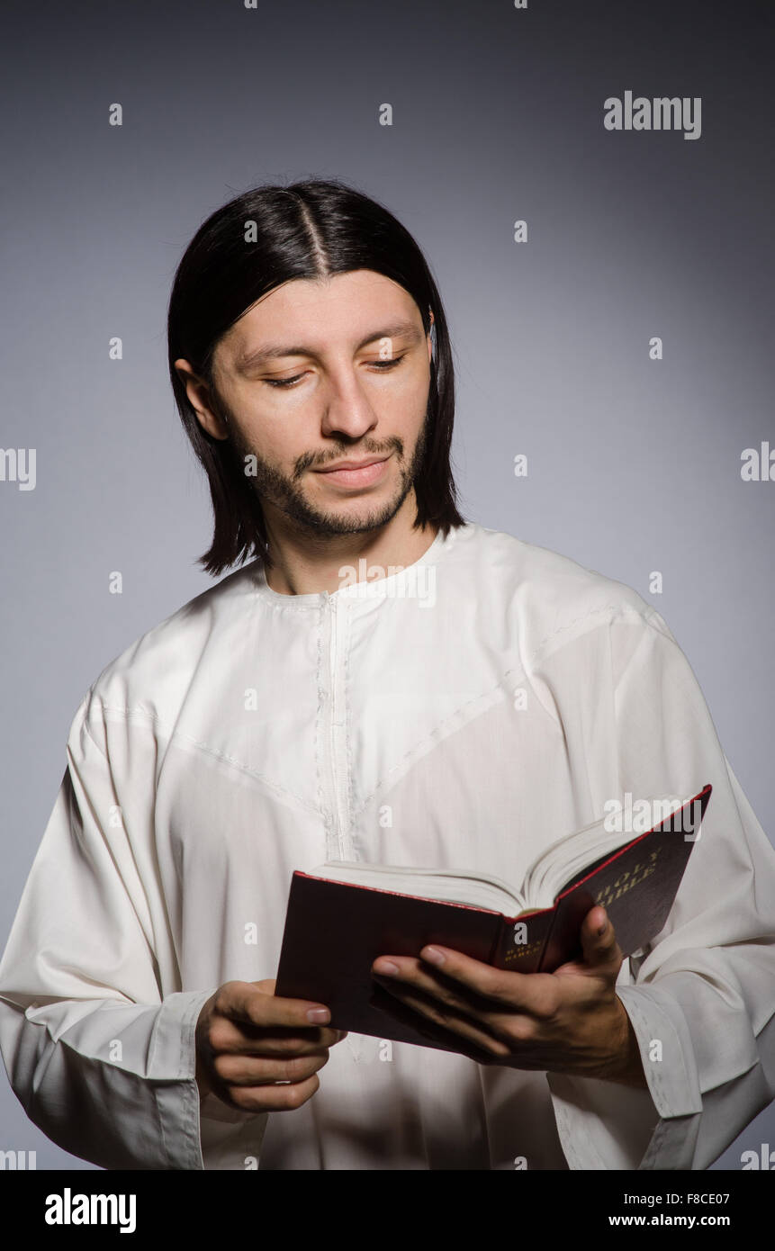 Priest man in religious concept Stock Photo - Alamy
