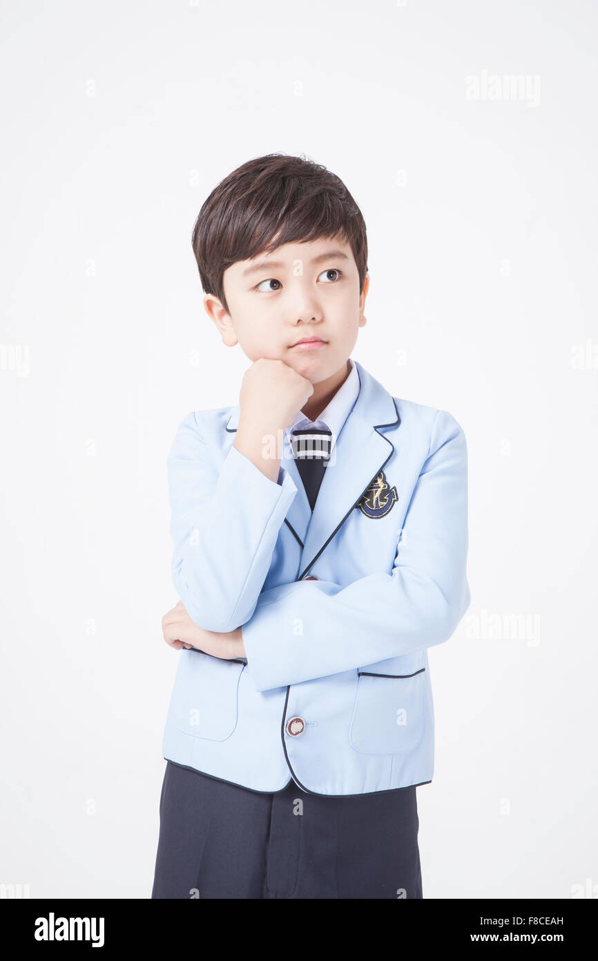 Putting on uniform for school hi-res stock photography and images - Alamy