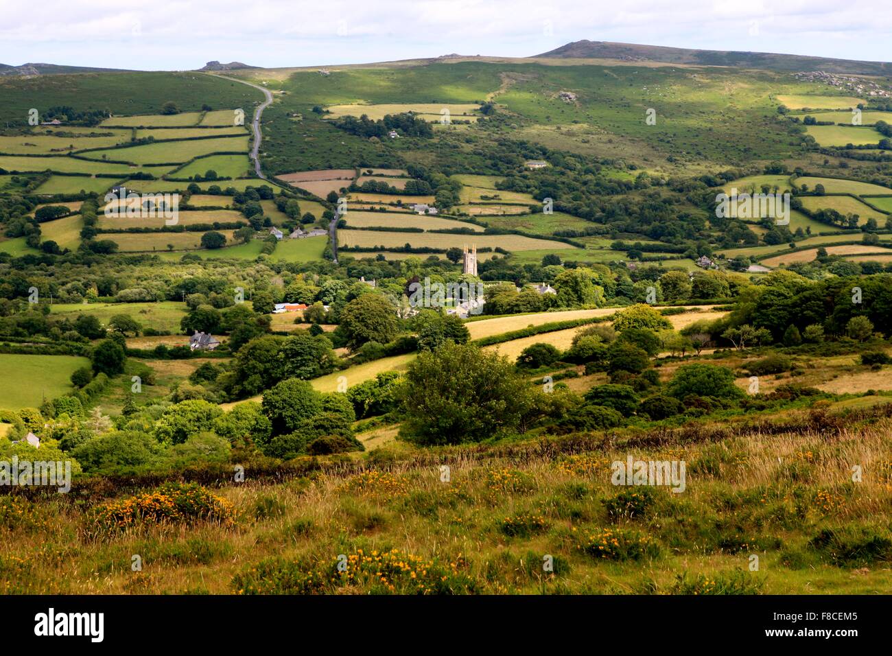 The beautiful location of Widecombe-in-the-Moor with the Church of ...