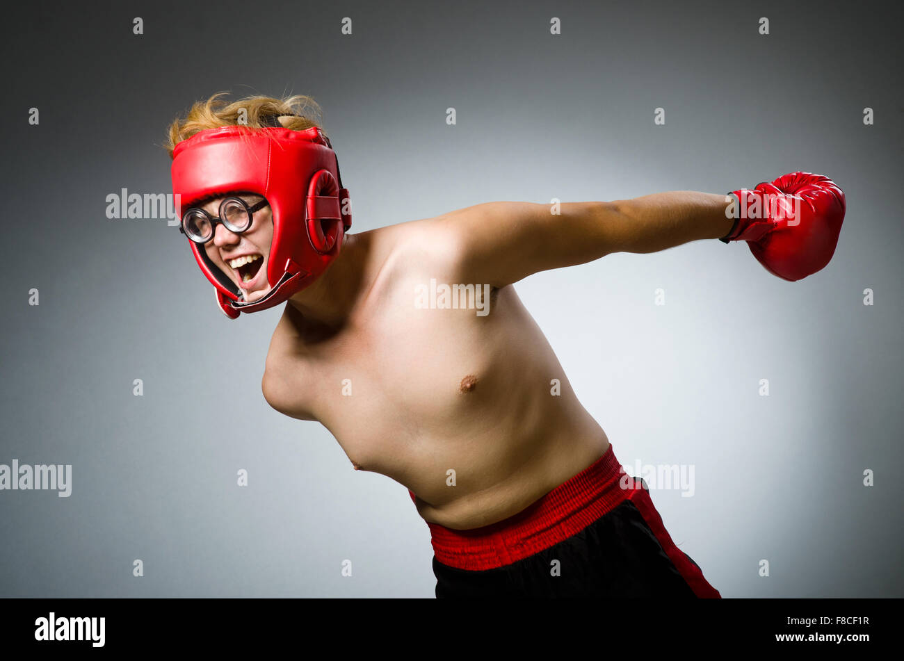 Funny boxer against dark background Stock Photo - Alamy