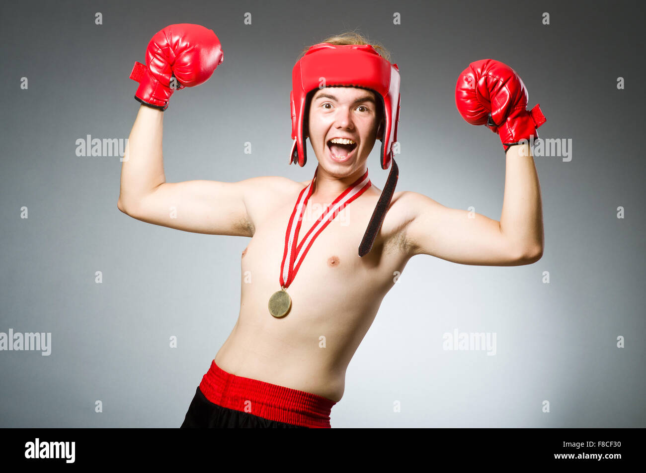 Funny boxer with winning gold medal Stock Photo - Alamy