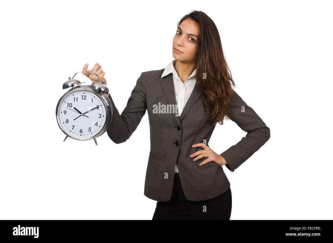 Businesswoman with clock missing her deadlines Stock Photo - Alamy
