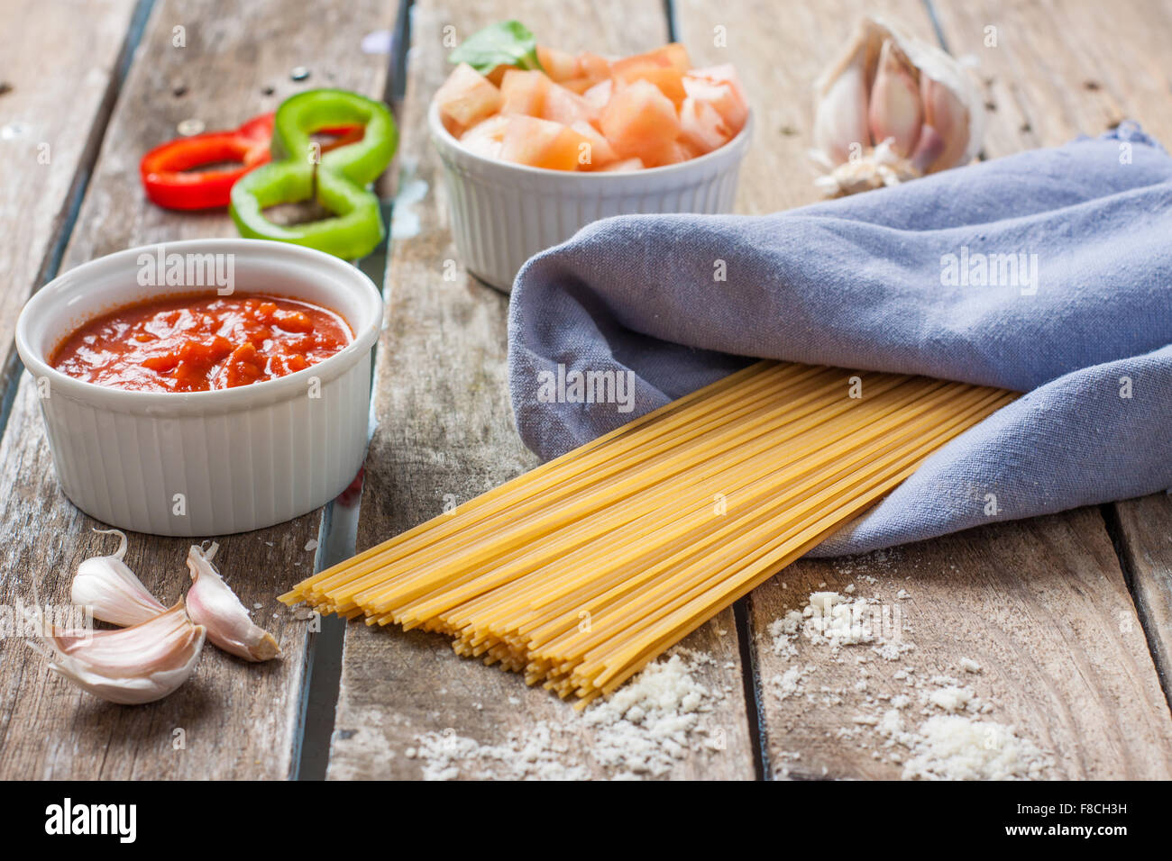 preparing spaghetti with tomato sauce italian recipe Stock Photo - Alamy