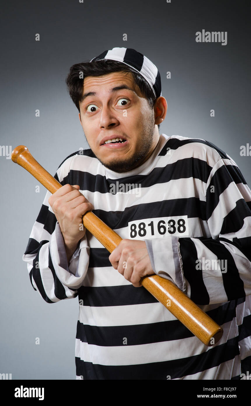 Funny prison inmate in concept Stock Photo - Alamy
