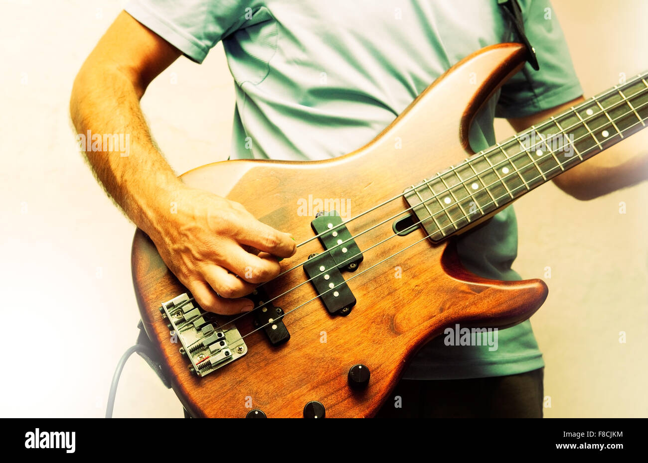 Close up image of bassist Stock Photo - Alamy