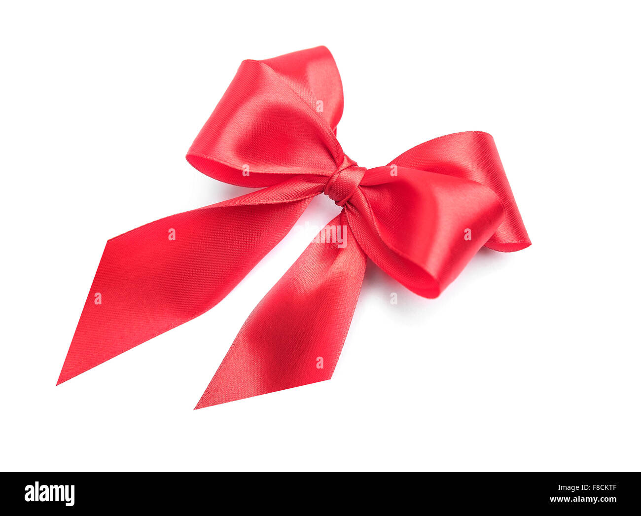 Red bow on white background Stock Photo - Alamy