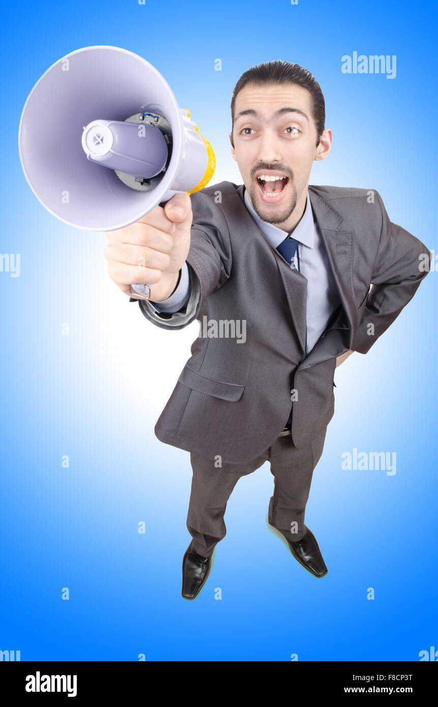 Man shouting and yelling with loudspeaker Stock Photo - Alamy
