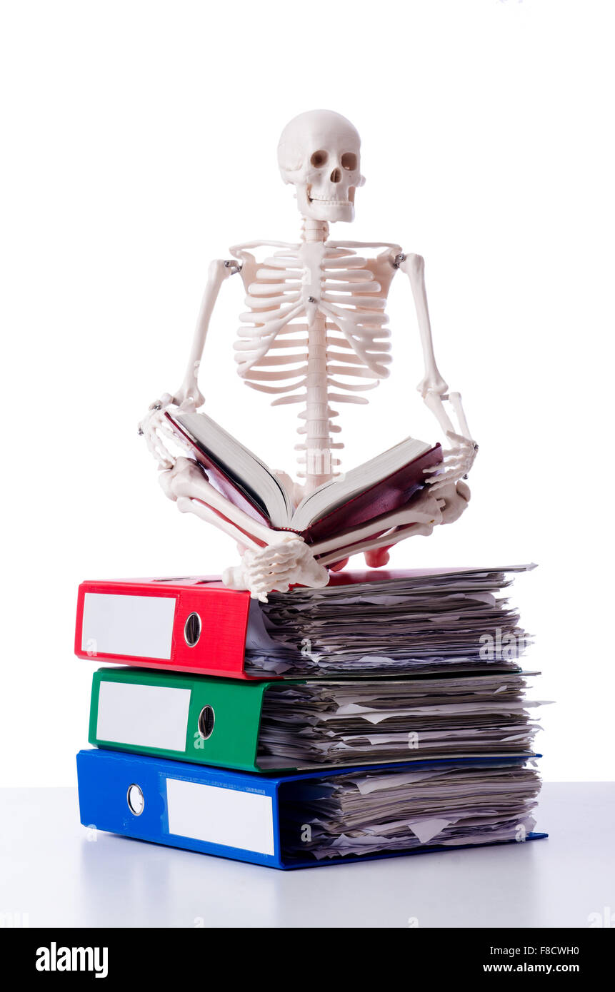 Skeleton with pile of files on white Stock Photo - Alamy
