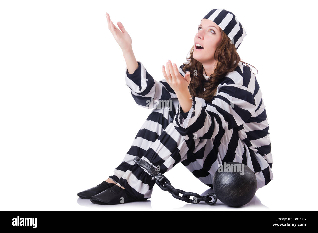 Prisoner in striped uniform on white Stock Photo - Alamy